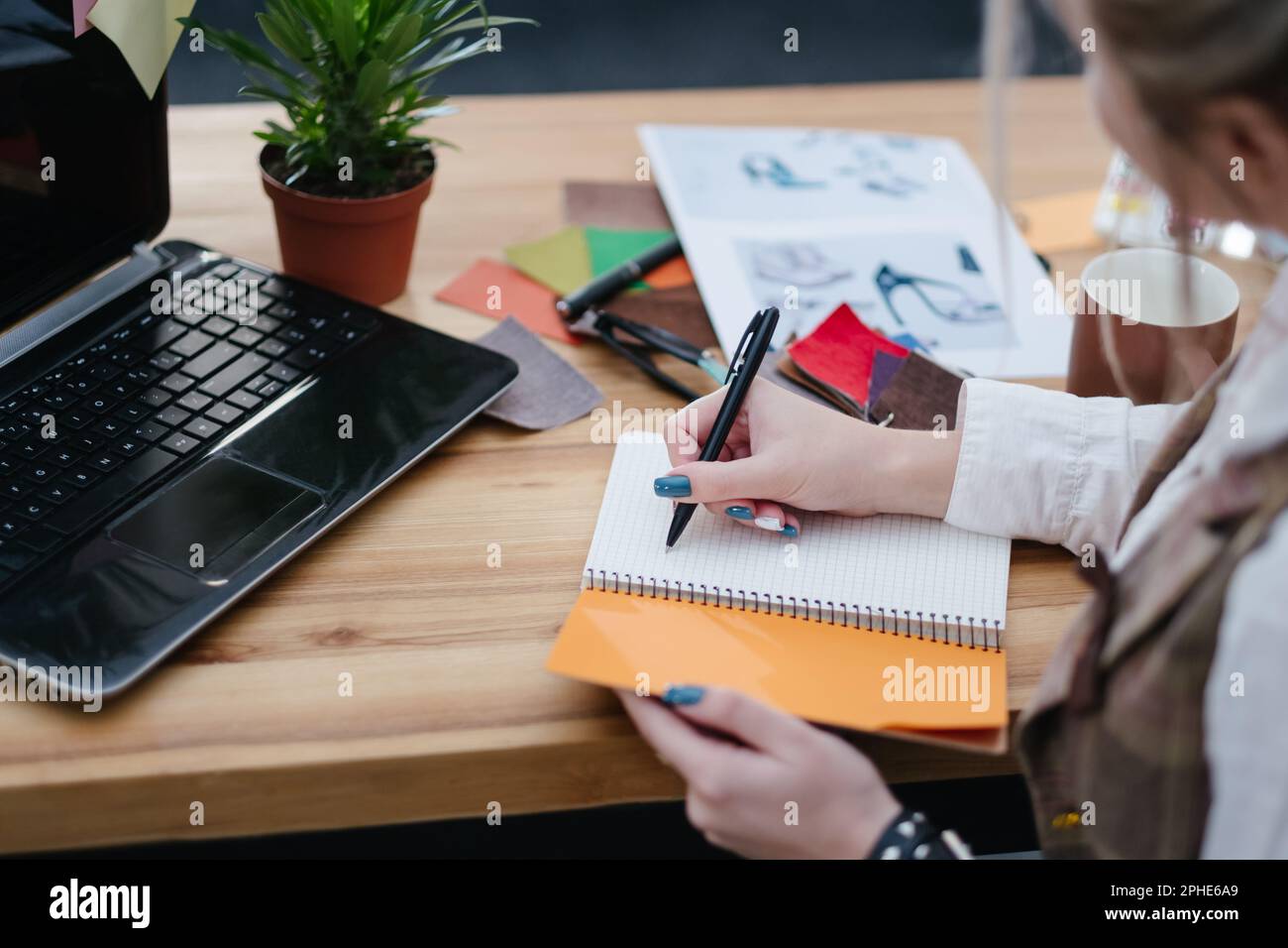 fashion designer work process business workspace Stock Photo - Alamy