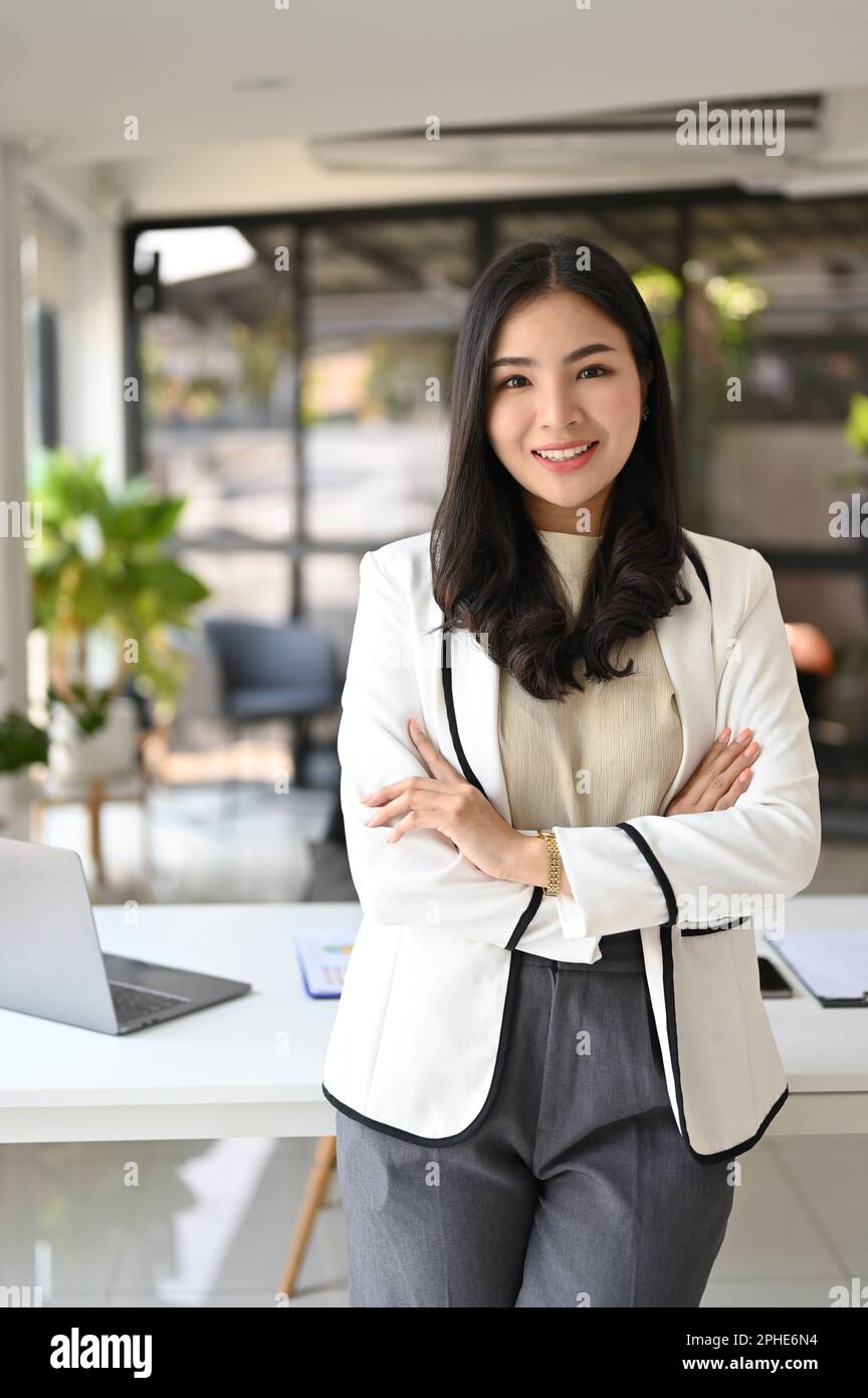 Portrait of a confident and successful millennial Asian businesswoman ...