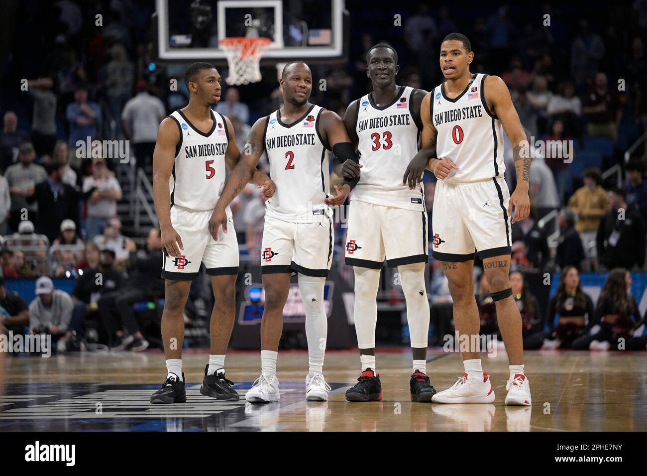 San Diego State guard Lamont Butler (5), guard Adam Seiko (2), forward ...