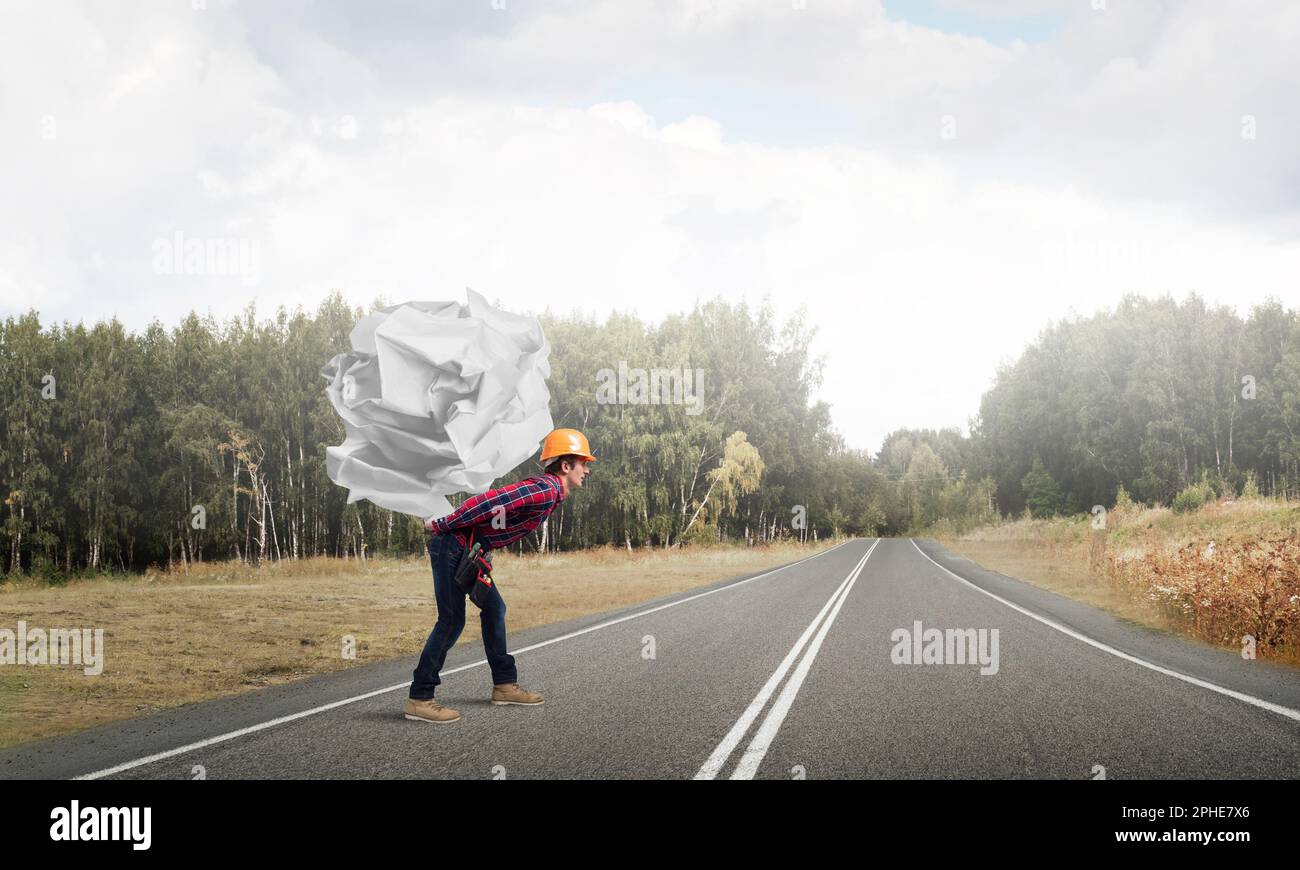Engineer man carry load Stock Photo - Alamy