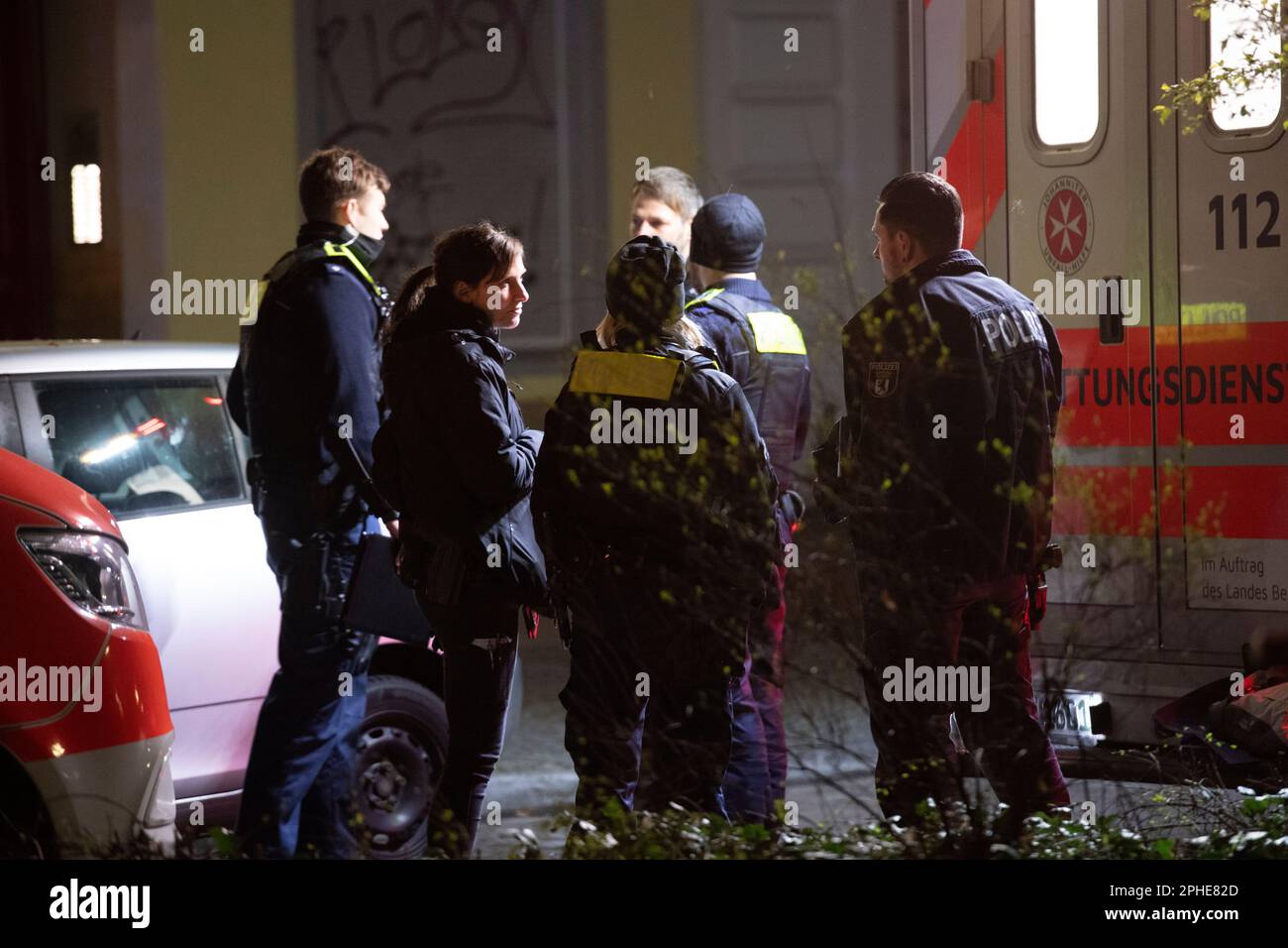 Berlin, Germany. 28th Mar, 2023. Police officers stand in front of a ...