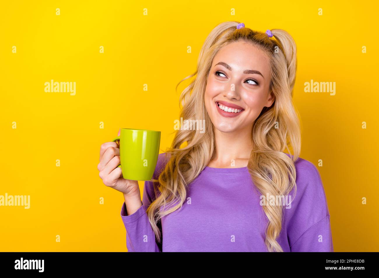 Photo of dreamy shiny lady dressed purple shirt drinking hot tea ...