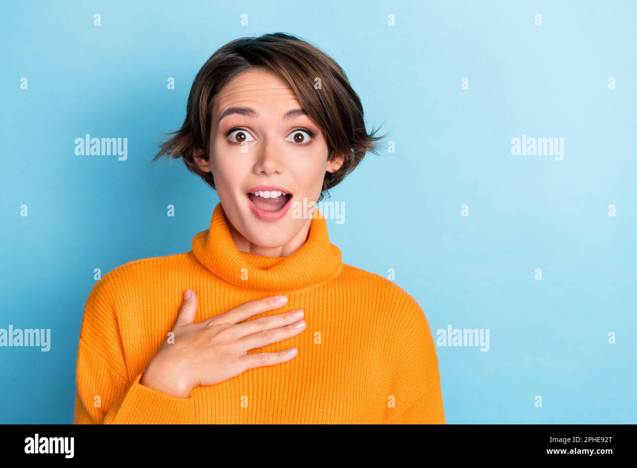 Portrait of impressed positive lady hand touch chest open mouth empty ...