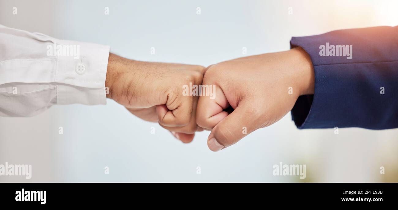 Business people, hands and fist bump in teamwork agreement for good job ...