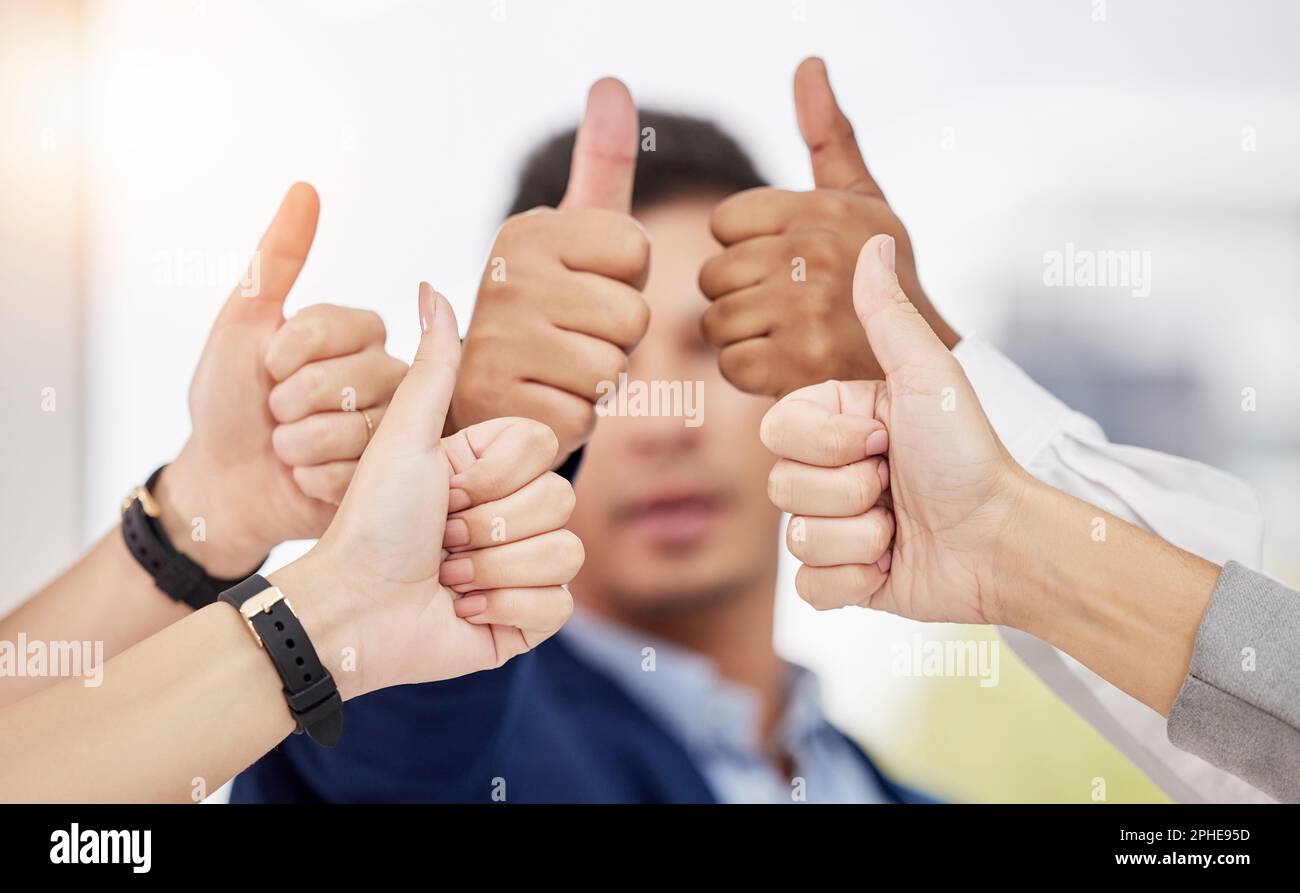 Business people, hands and thumbs up in teamwork agreement for good job, winning or success at ...