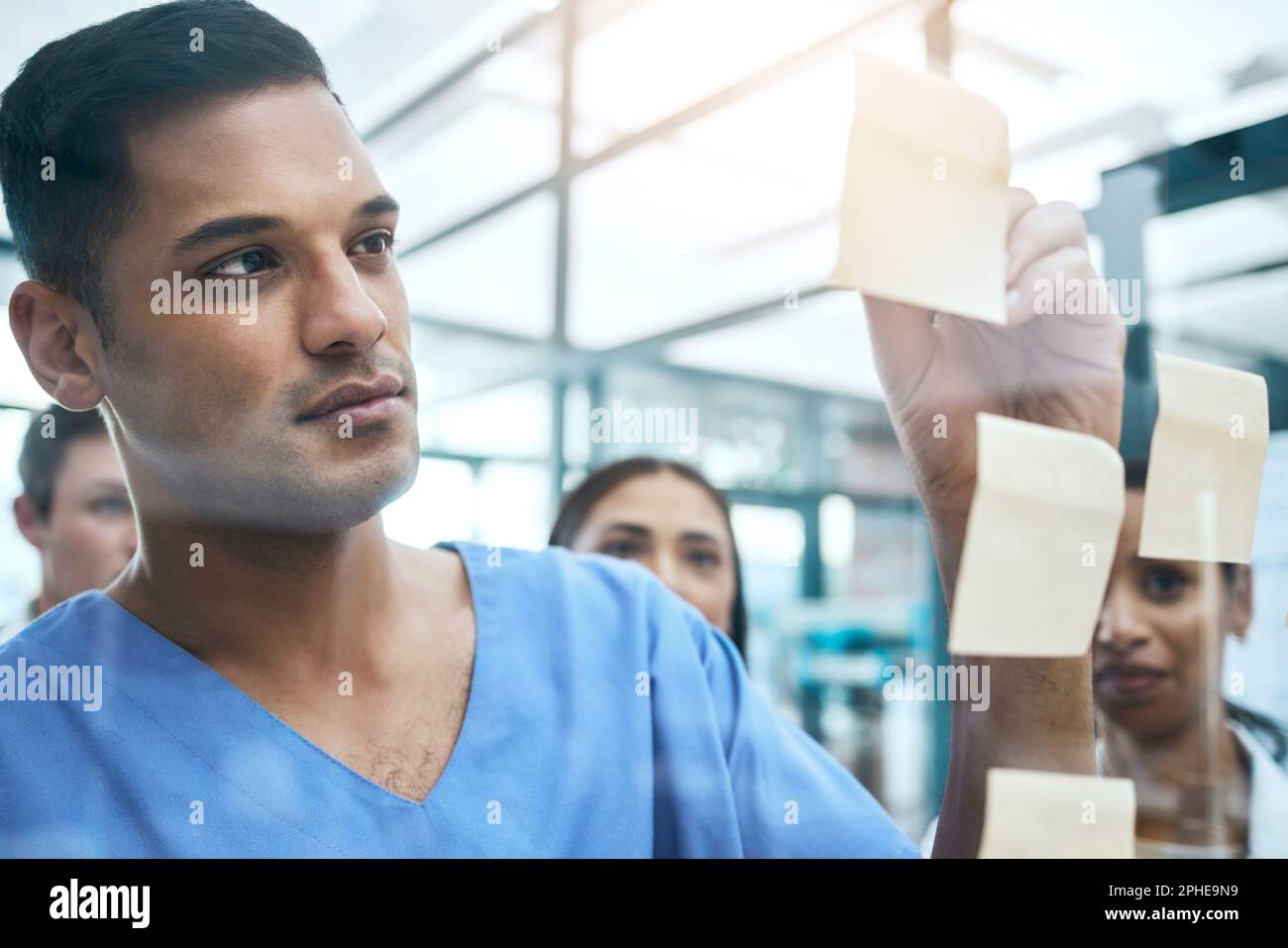 Planning, brainstorming and doctors on glass, sticky note and training ...