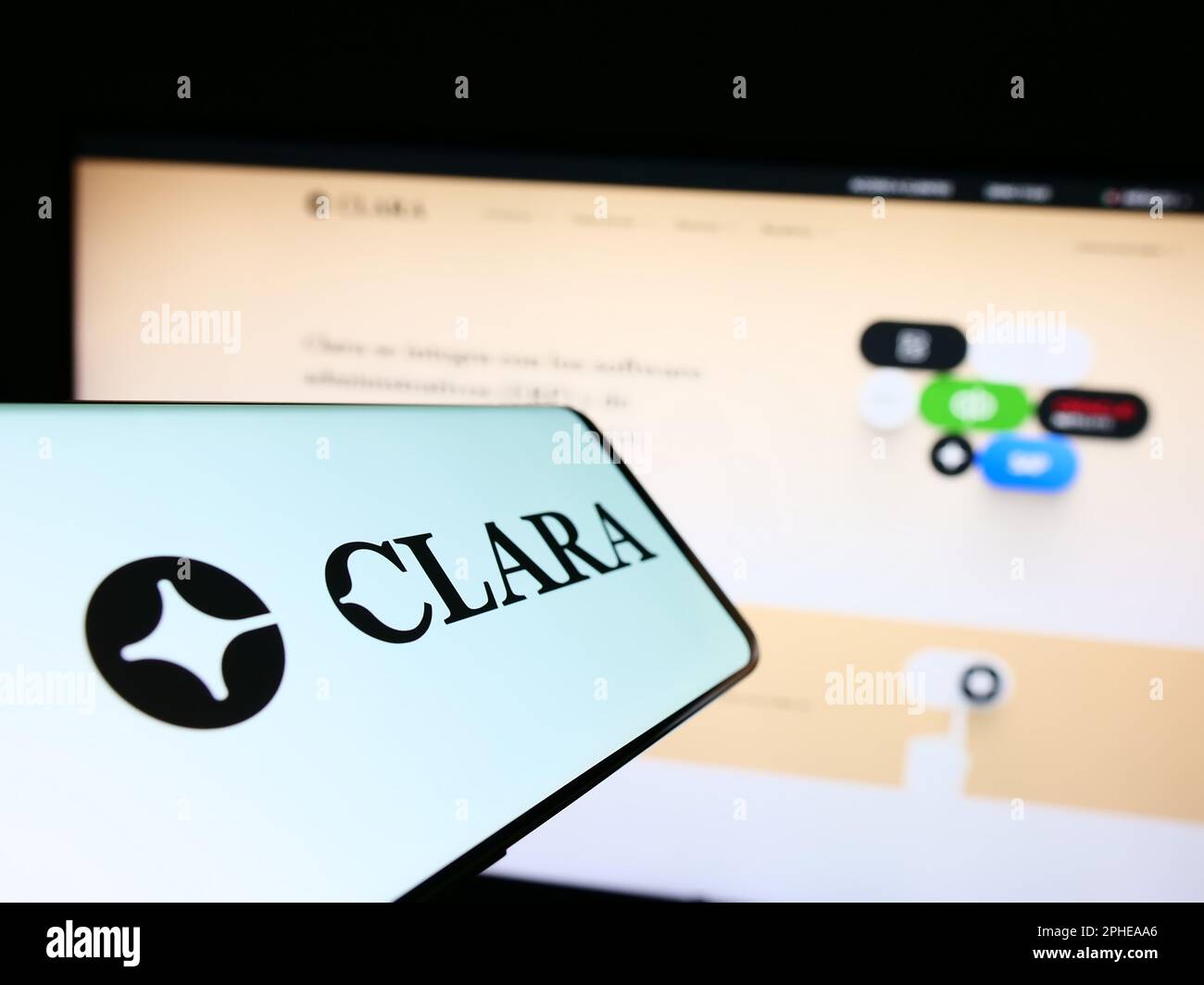Mobile phone with logo of Mexican fintech company Clara on screen in ...