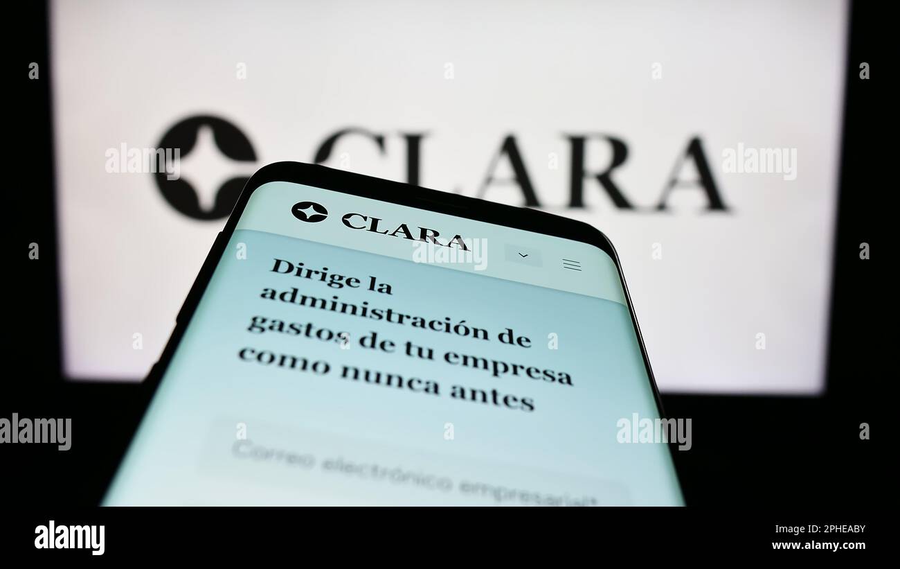 Mobile phone with web page of Mexican fintech company Clara on screen ...