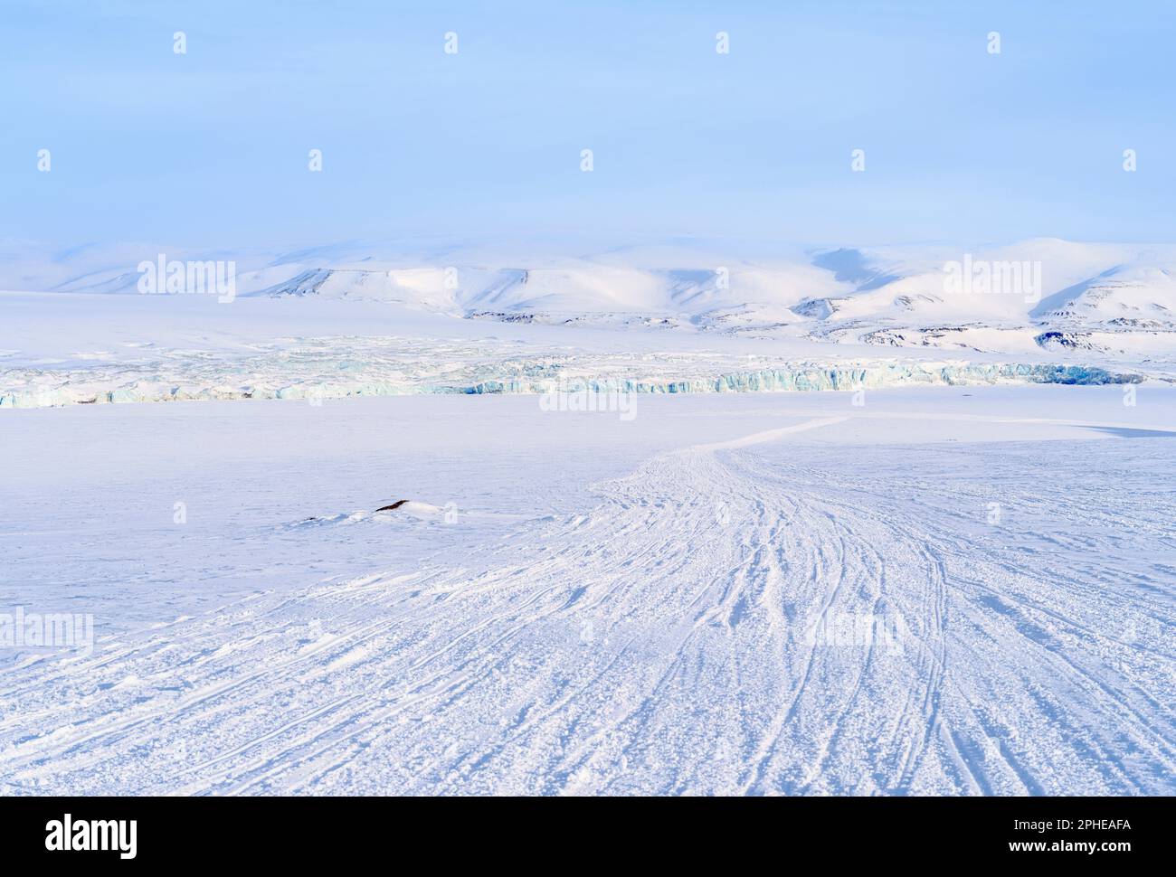 Landscape with tracks of snowmobiles during winter near Mohnbukta and ...