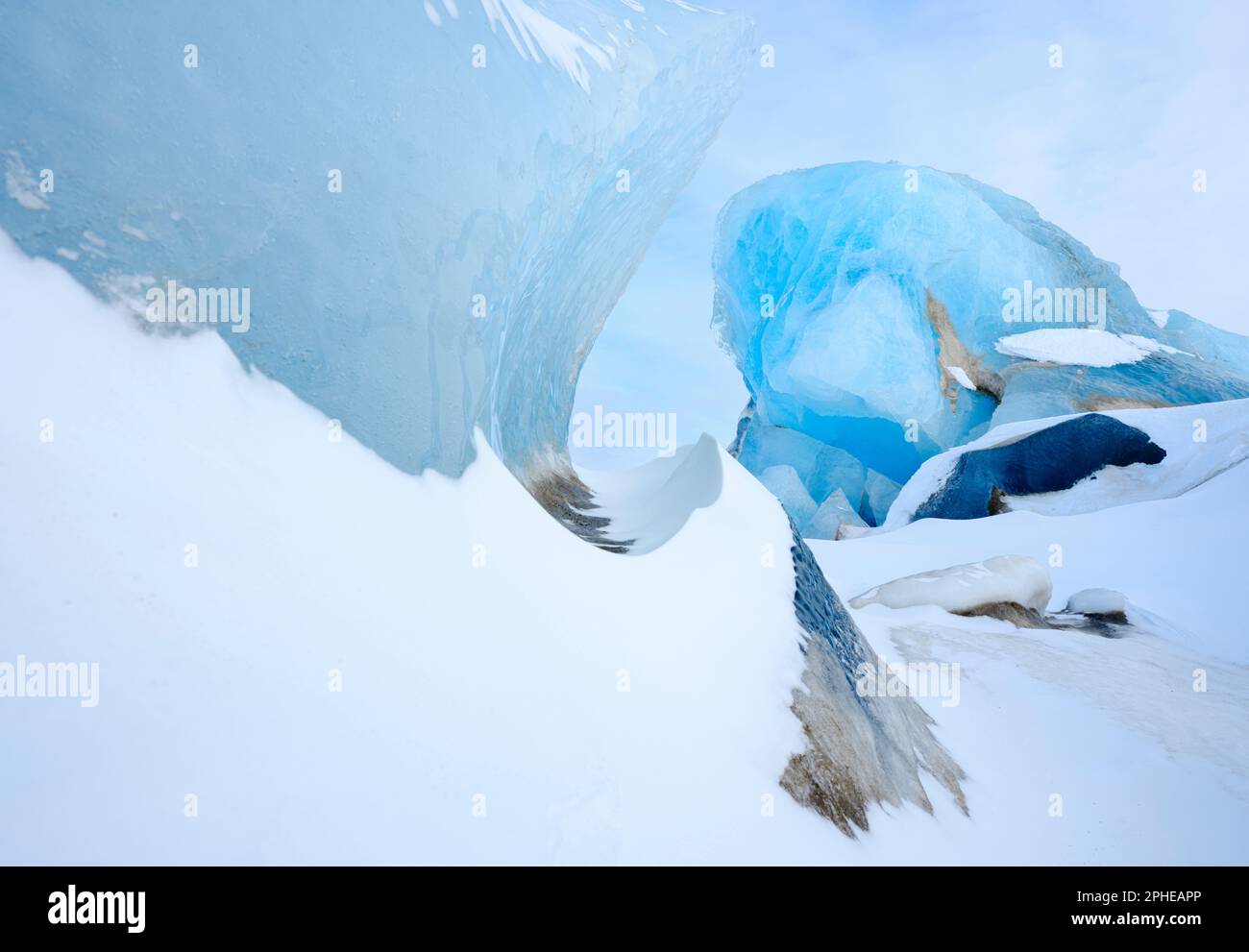 Iceberg in the frozen Mohnbukta in Sabine-Land. The island Spitzbergen ...
