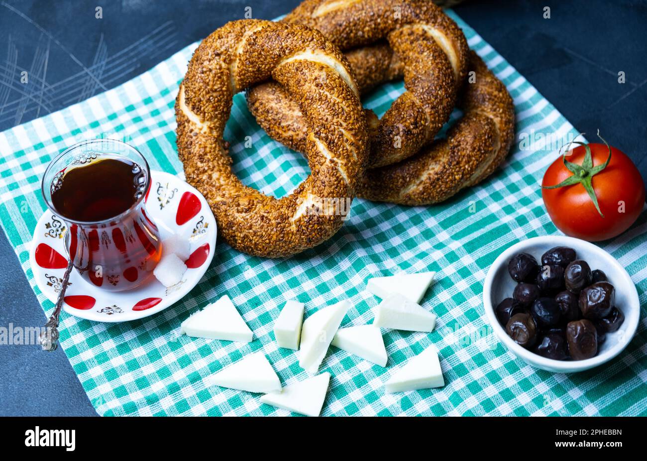 Traditional Turkish breakfast olives, bagel, cheese, tea, top view ...