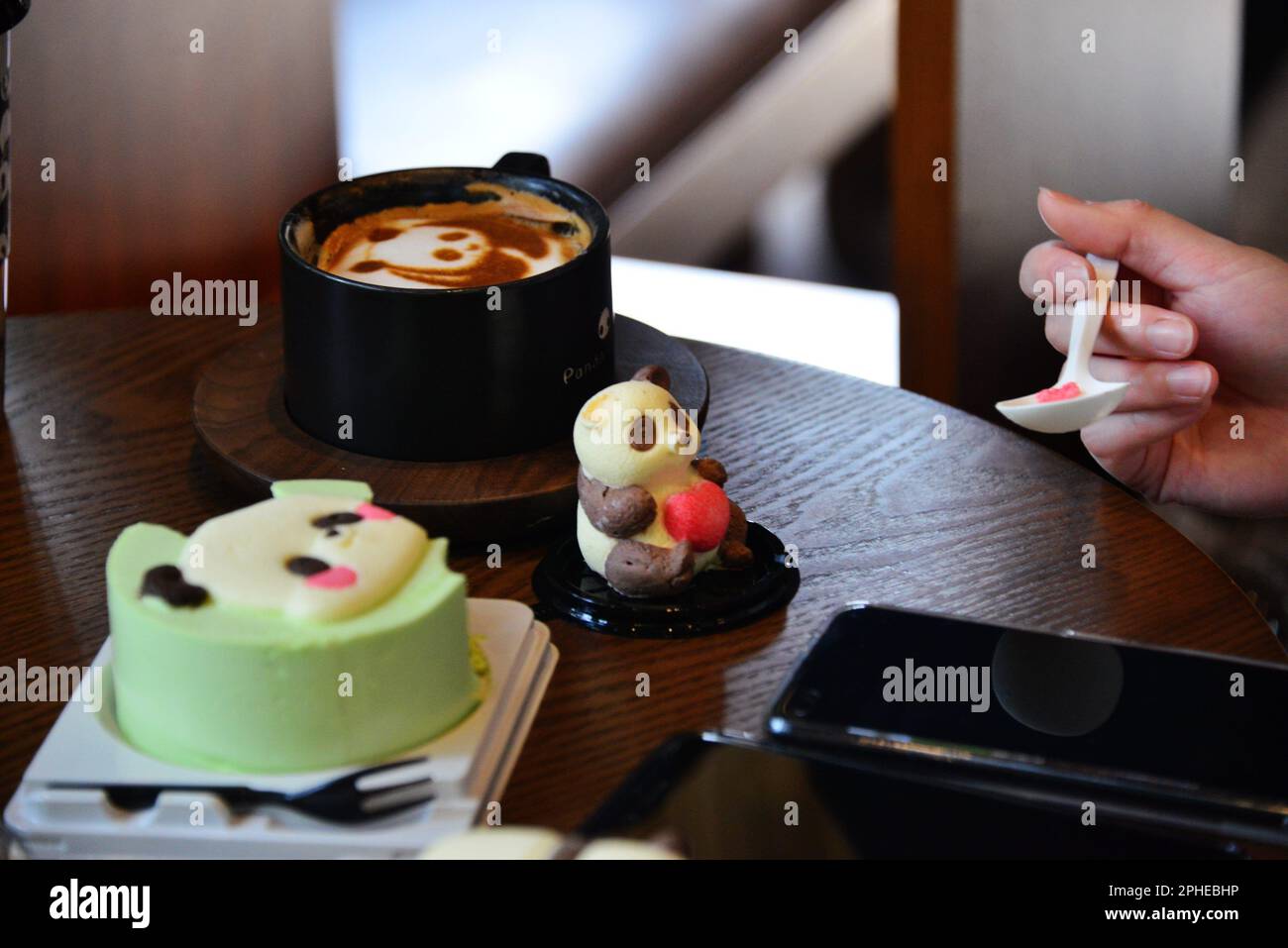 BEIJING, CHINA - MARCH 28, 2023 - Young people eat at the Panda Cafe on ...