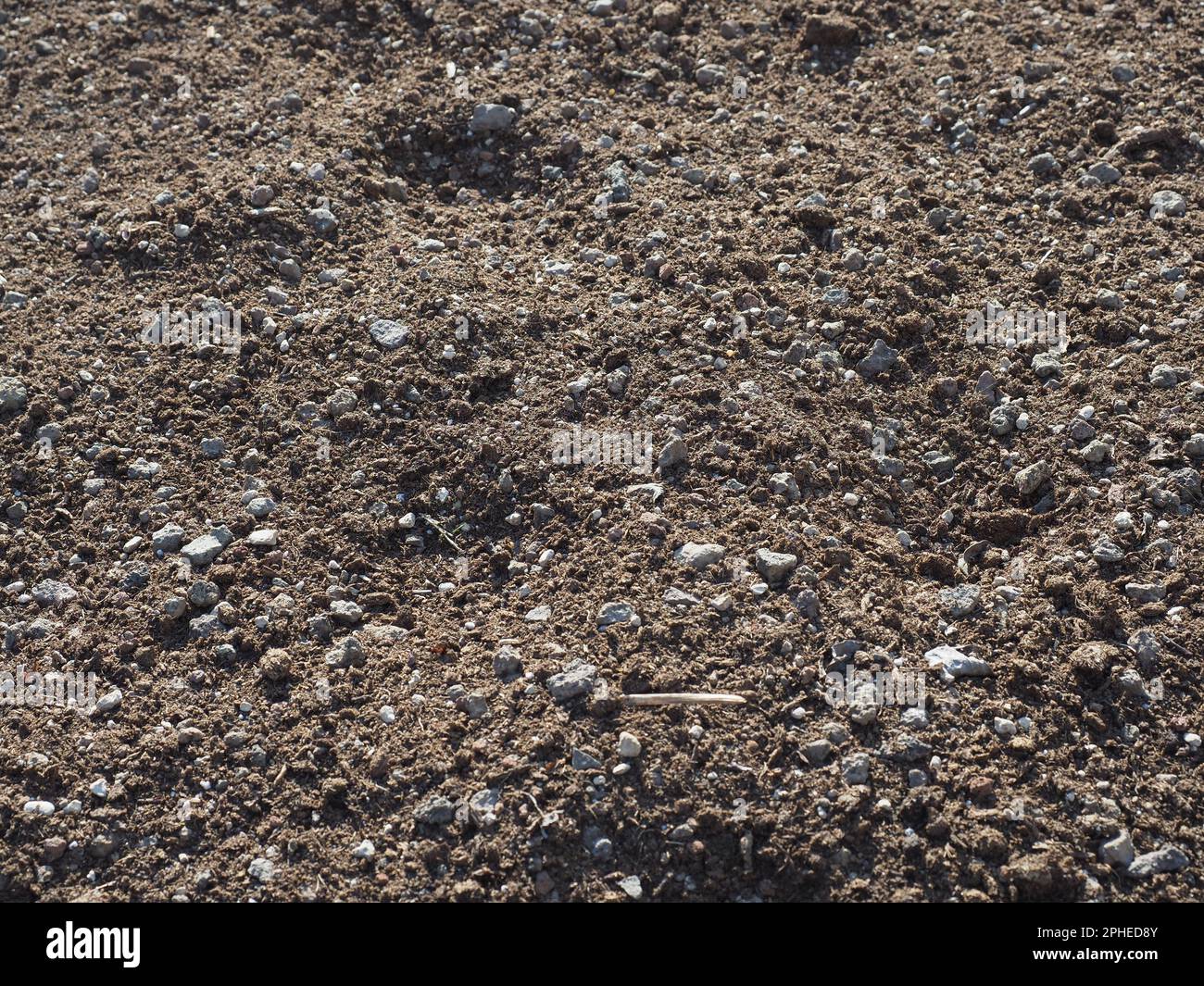 brown earth soil texture useful as a background Stock Photo - Alamy