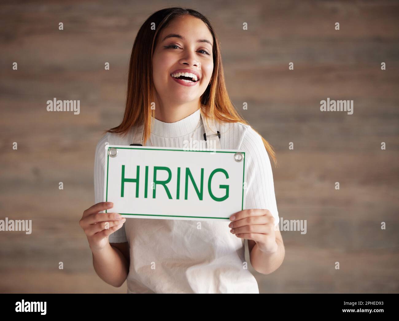 Woman, portrait and hiring sign for small business recruitment, career ...