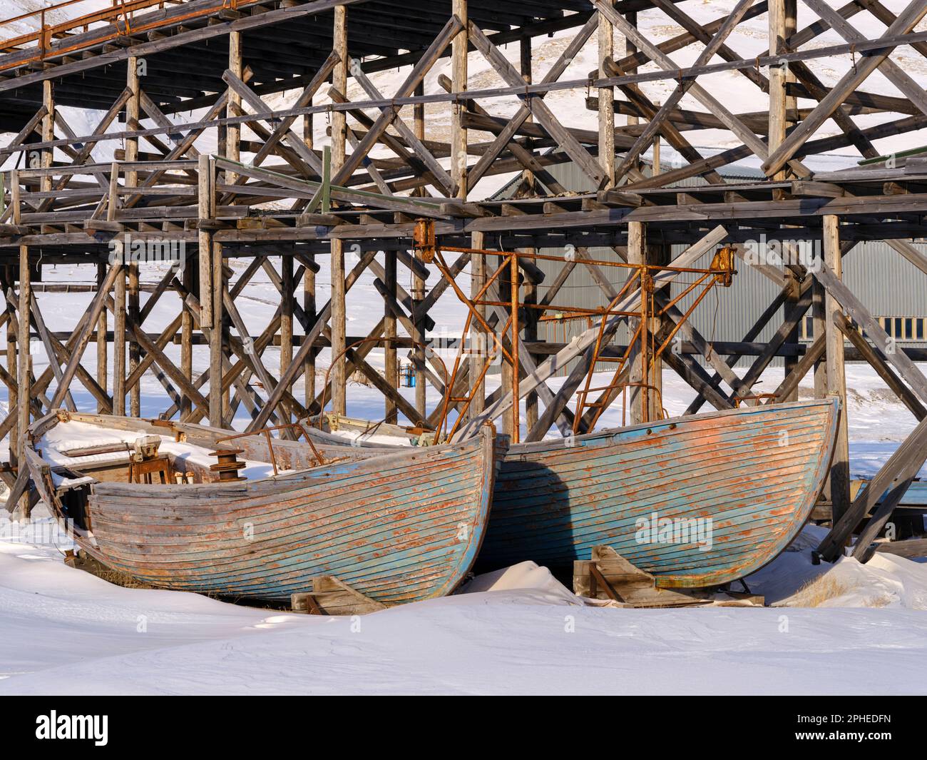 Harbour with old boats. Pyramiden, abandoned russian mining settlement ...