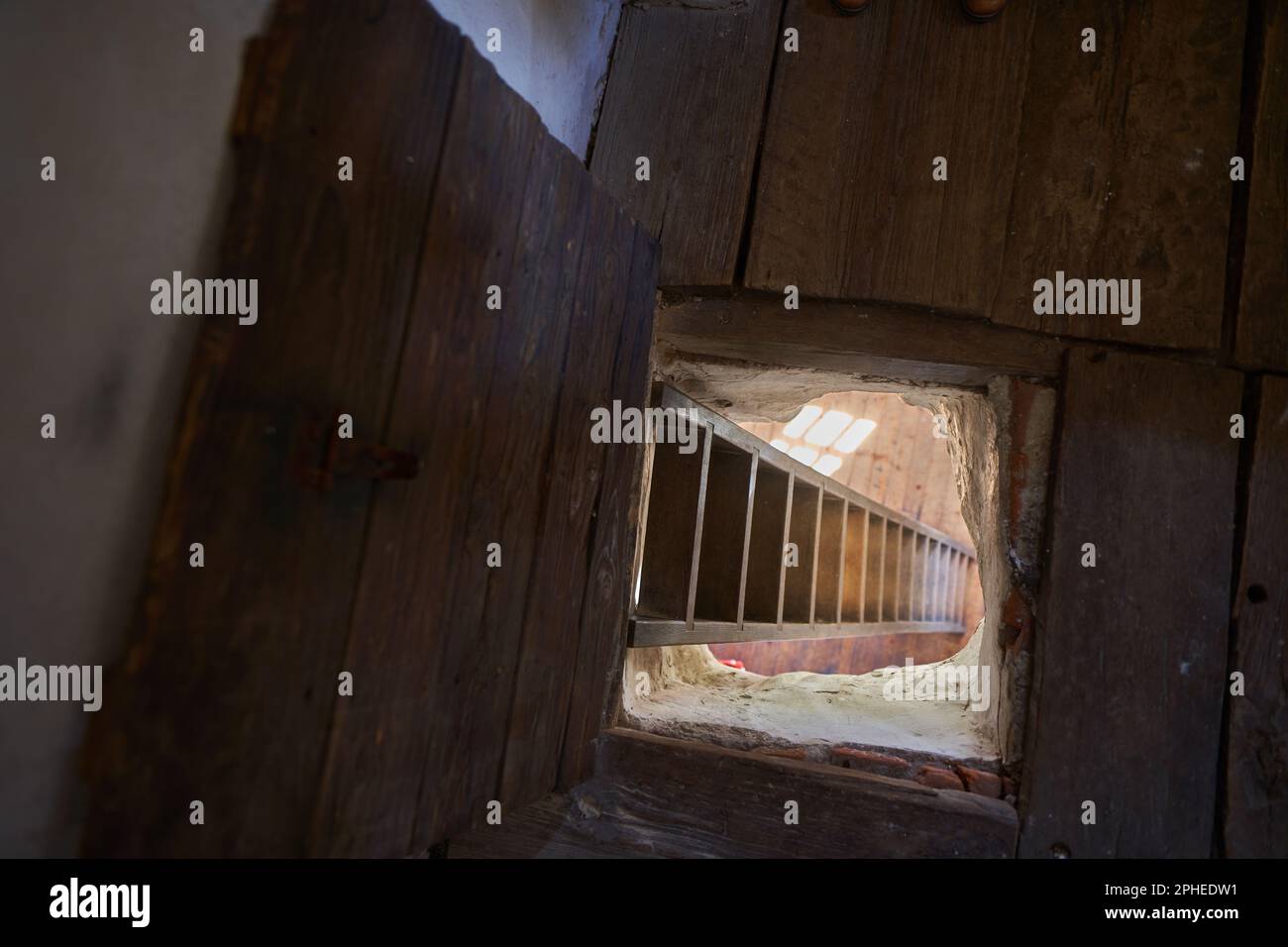 Hardwood ladder and a hatch inside an old medieval house Stock Photo ...