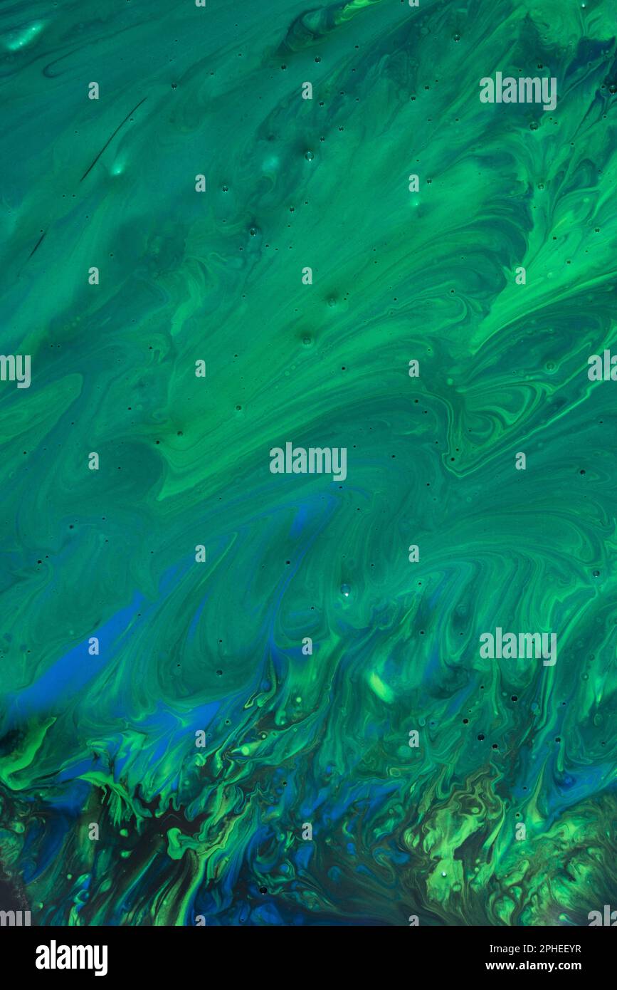 Beautiful abstraction of liquid paints in slow blending flow mixing ...