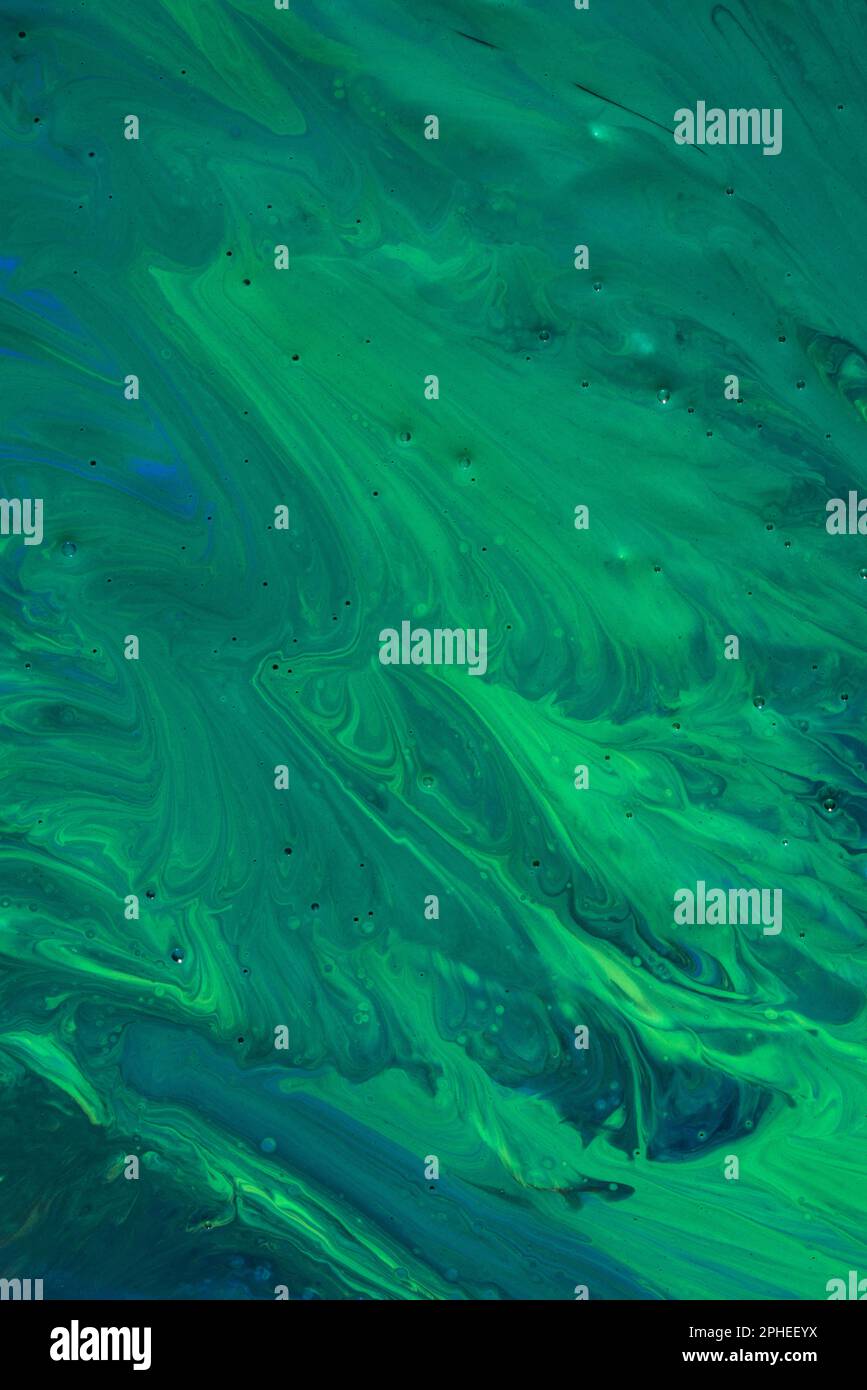 Beautiful abstraction of liquid paints in slow blending flow mixing ...