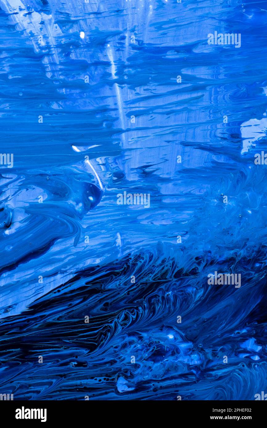 Beautiful abstraction of liquid paints in slow blending flow mixing ...