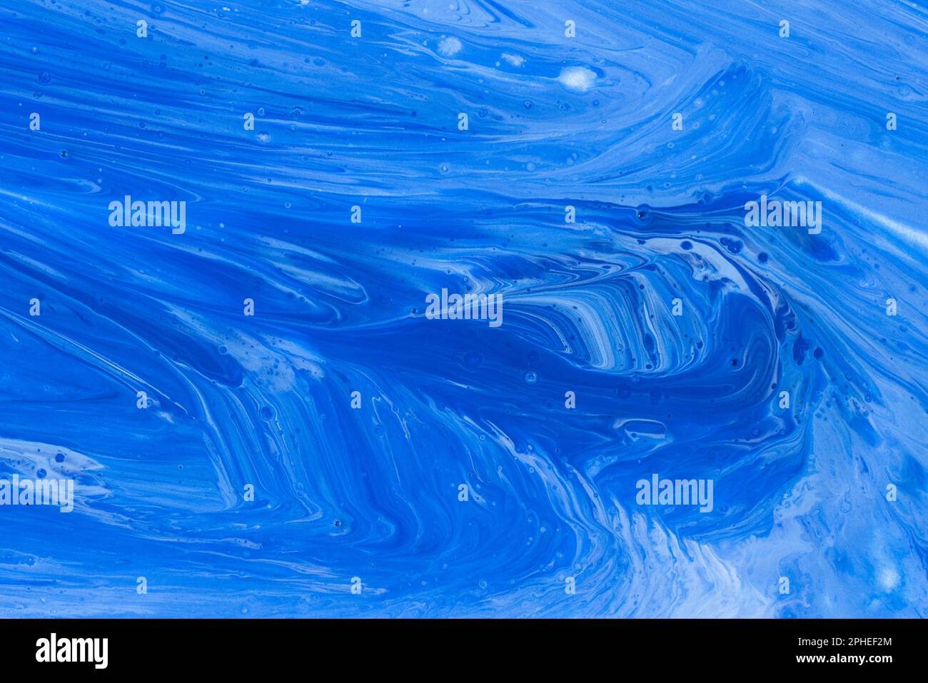 Beautiful abstraction of liquid paints in slow blending flow mixing ...