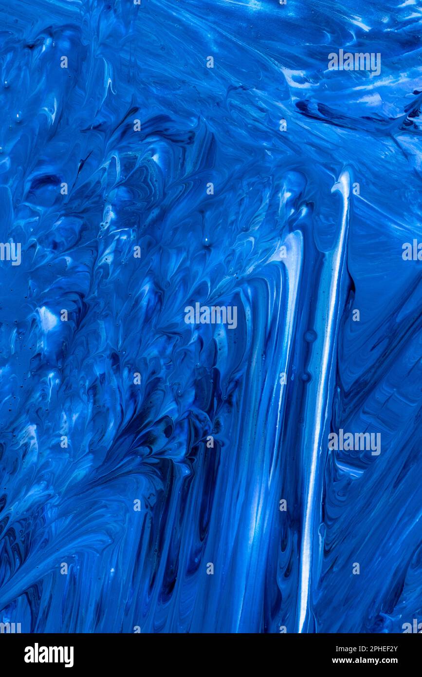 Beautiful abstraction of liquid paints in slow blending flow mixing ...