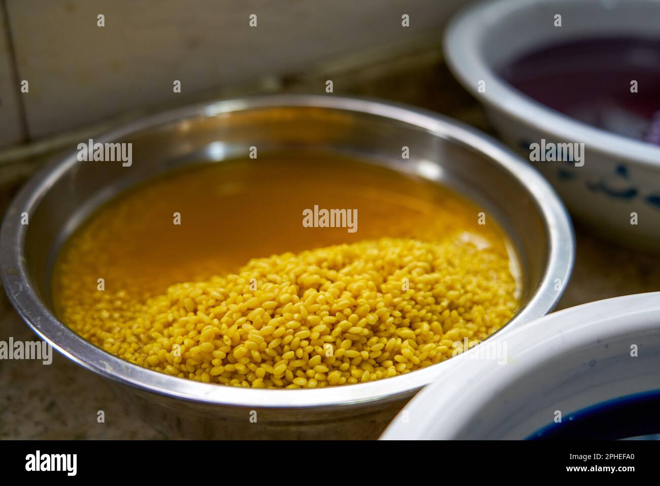 The process of making five-color glutinous rice, a traditional food for ...
