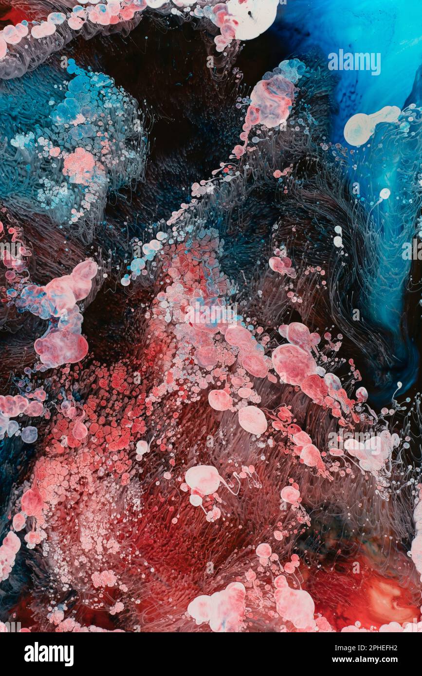 Beautiful abstraction of liquid paints in slow blending flow mixing ...