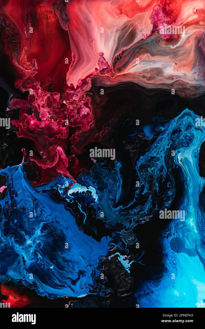 Beautiful abstraction of liquid paints in slow blending flow mixing ...