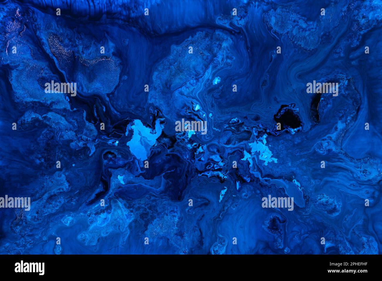 Beautiful abstraction of liquid paints in slow blending flow mixing ...