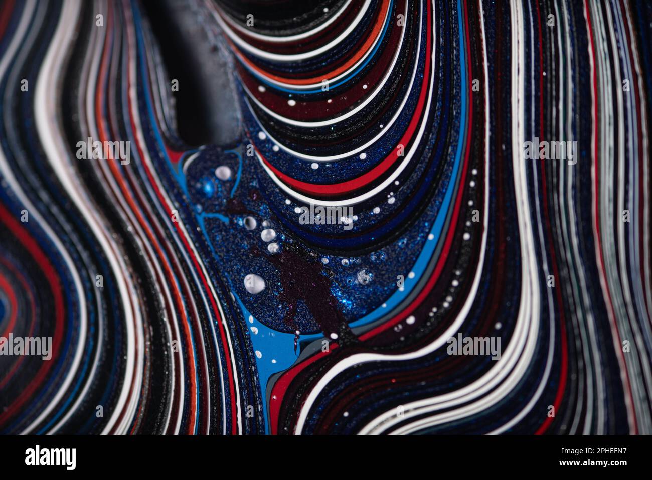 Surface of colorful fordite Stock Photo - Alamy