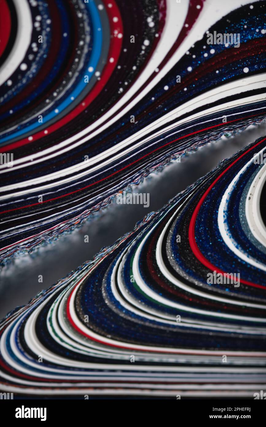 Surface of colorful fordite Stock Photo - Alamy