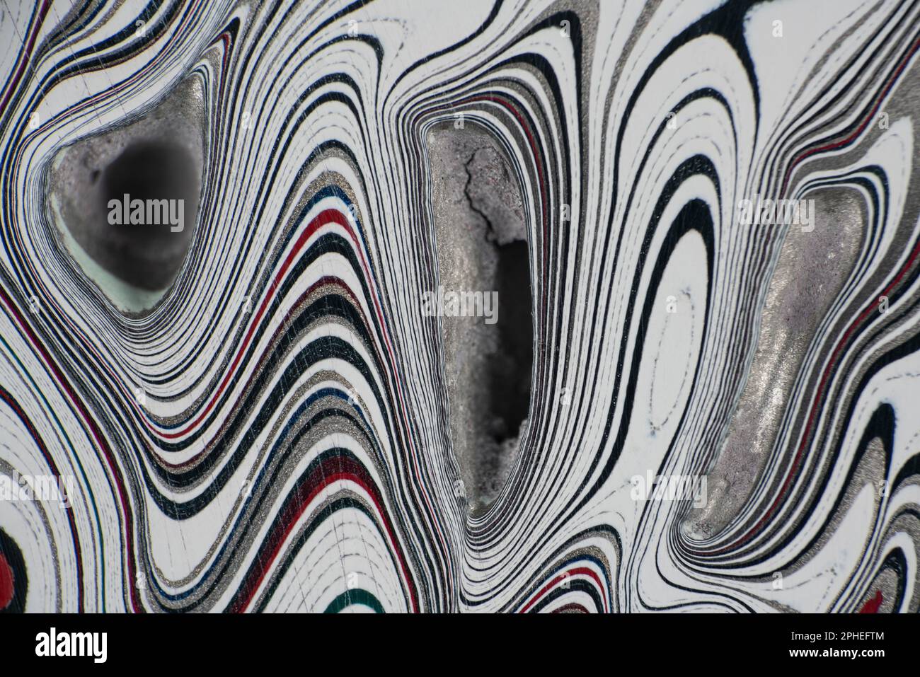 Fordite, also known as Motor or Detroit Agate, is a unique automotive enamel material with an ...