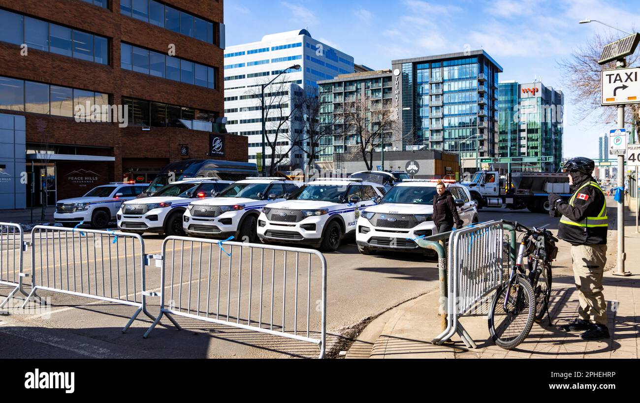 Edmonton, Canada. 27th Mar, 2023. Police officers pay respect during a ...