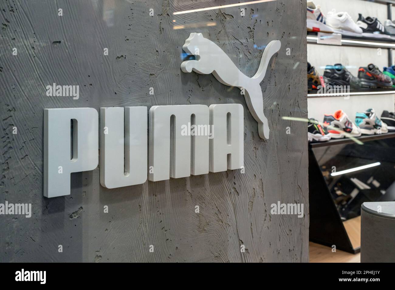 Puma sport brand on store. Close up shot of sign as seen at sport shoes ...
