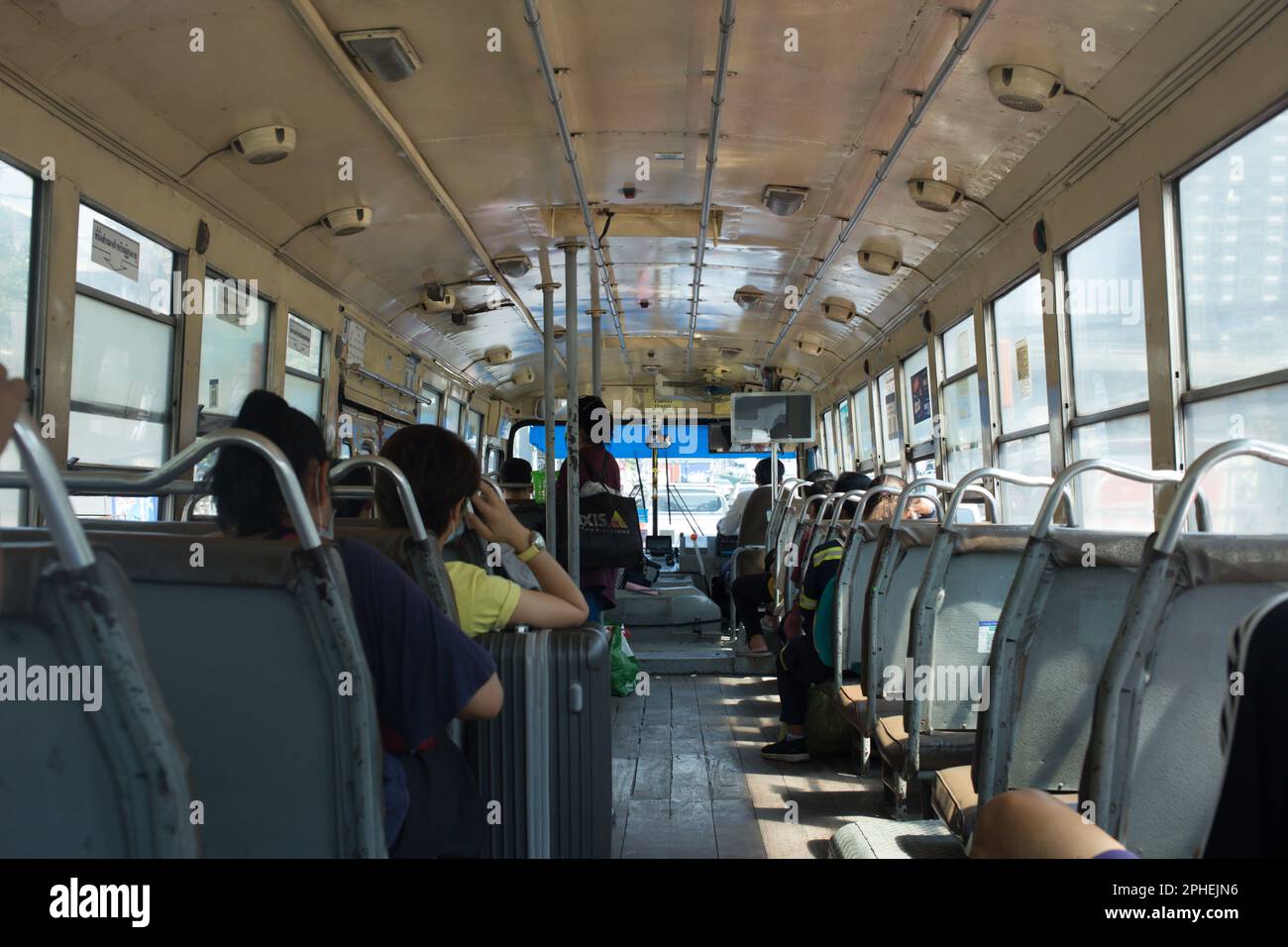 BANGKOK/THAILAND - February 25, 2023: Passenger sitting inside open air ...