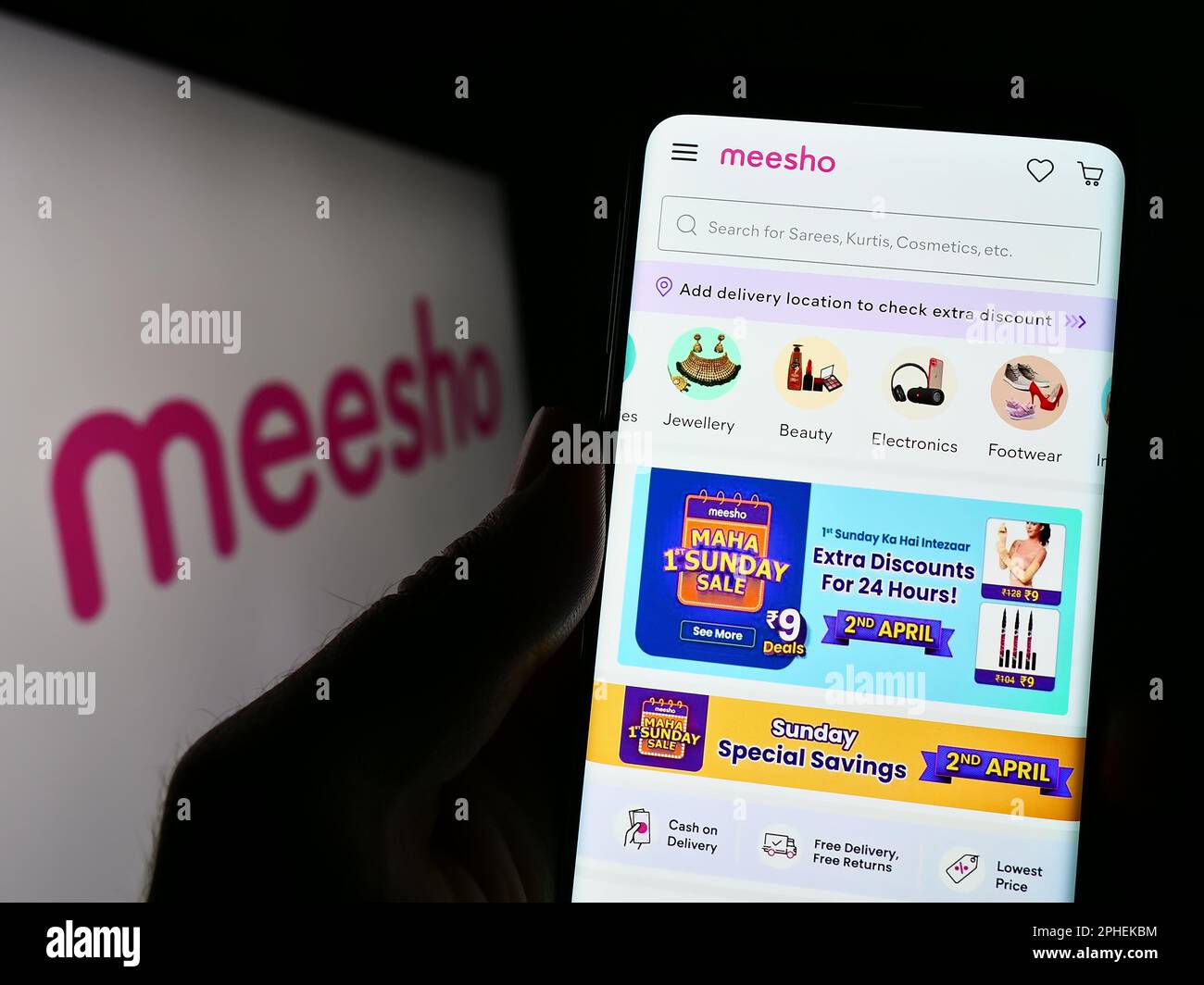 Person holding smartphone with web page of Indian e-commerce company ...