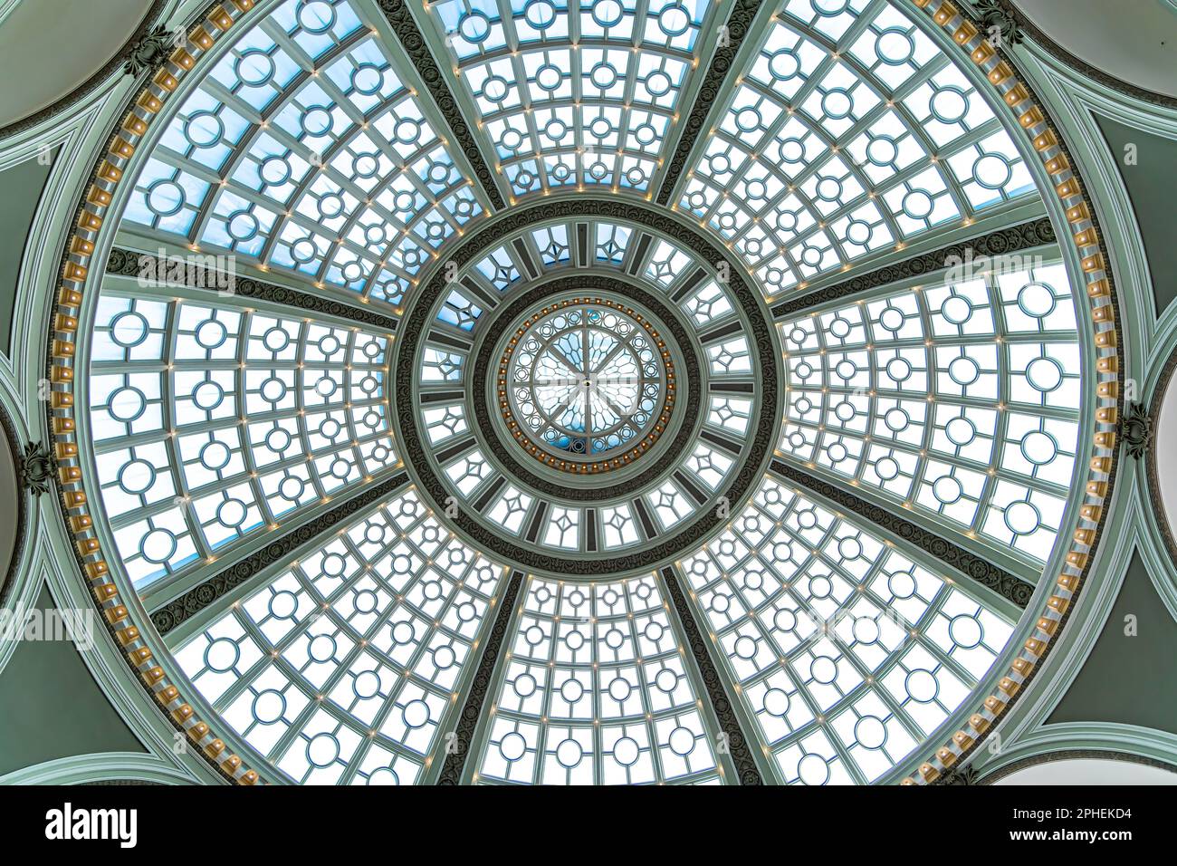 An antique intricately designed dome ceiling of a historic ...