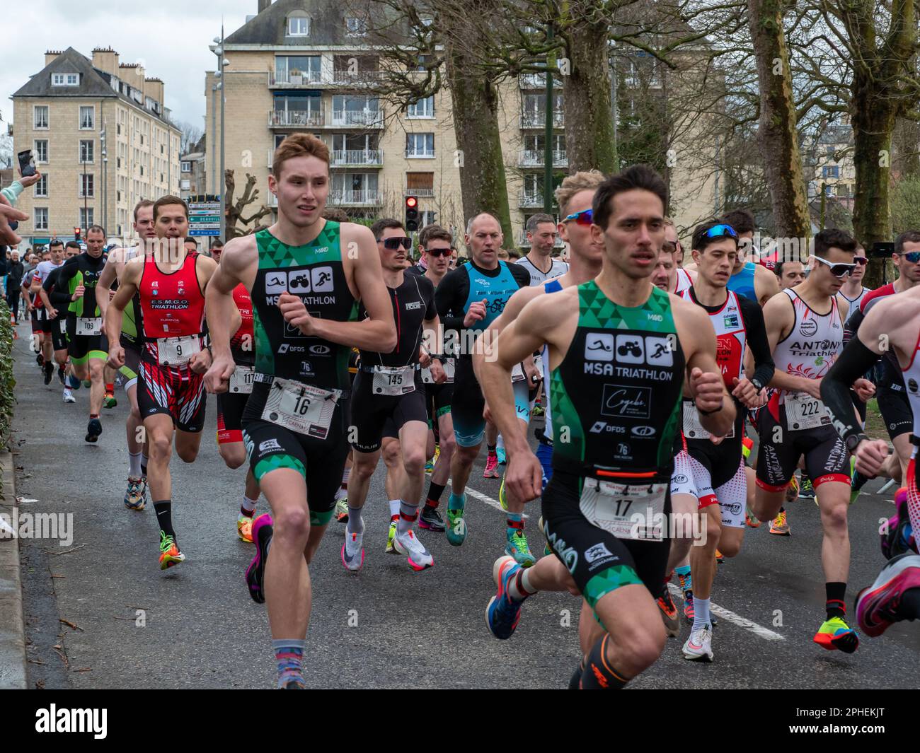 Caen, France 2023. Triathlon competition, athletes running in a group ...
