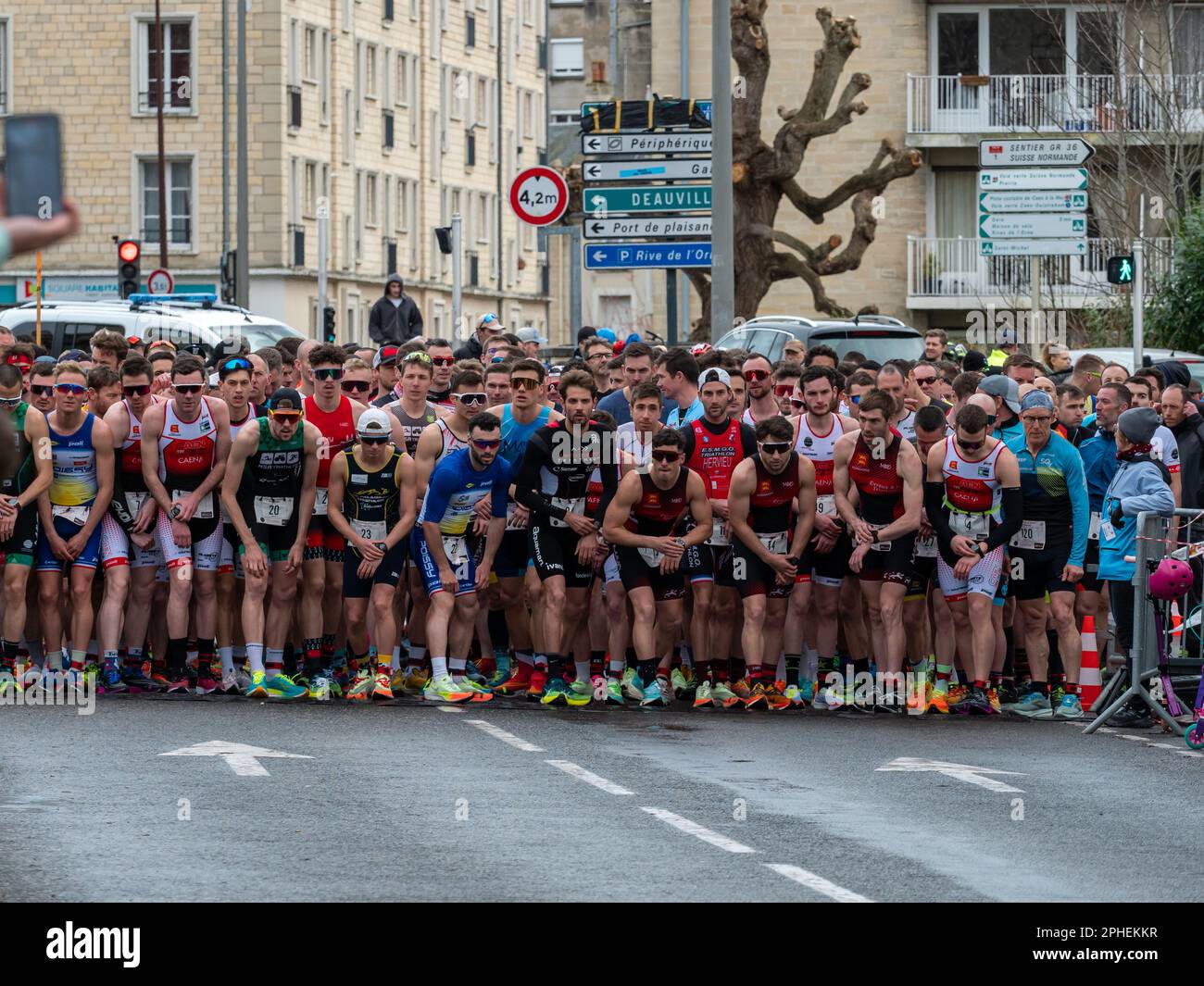 Caen, France 2023. Triathlon competition start, athletes ready to run ...