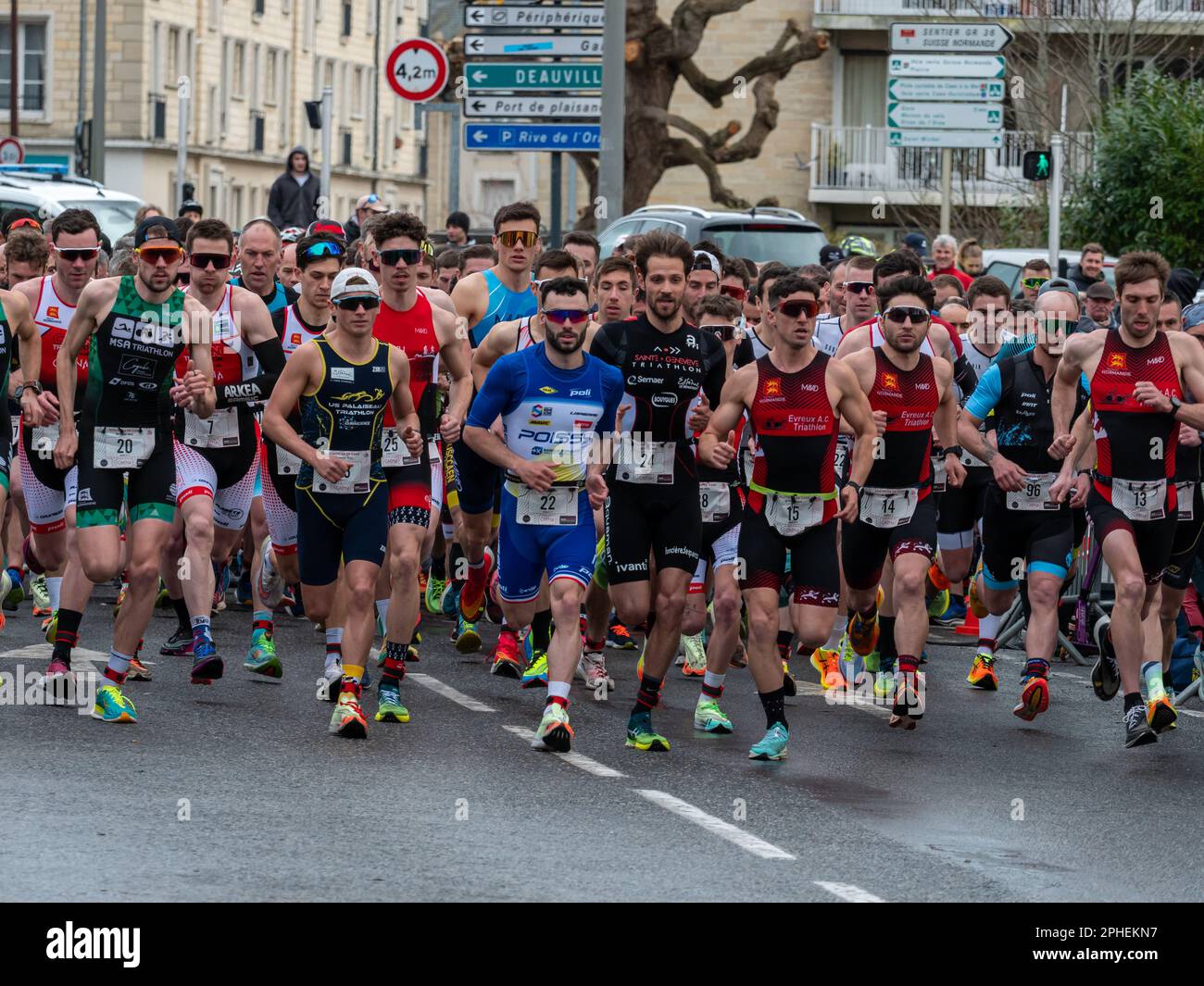 Caen, France 2023. Triathlon competition, athletes running in a group ...