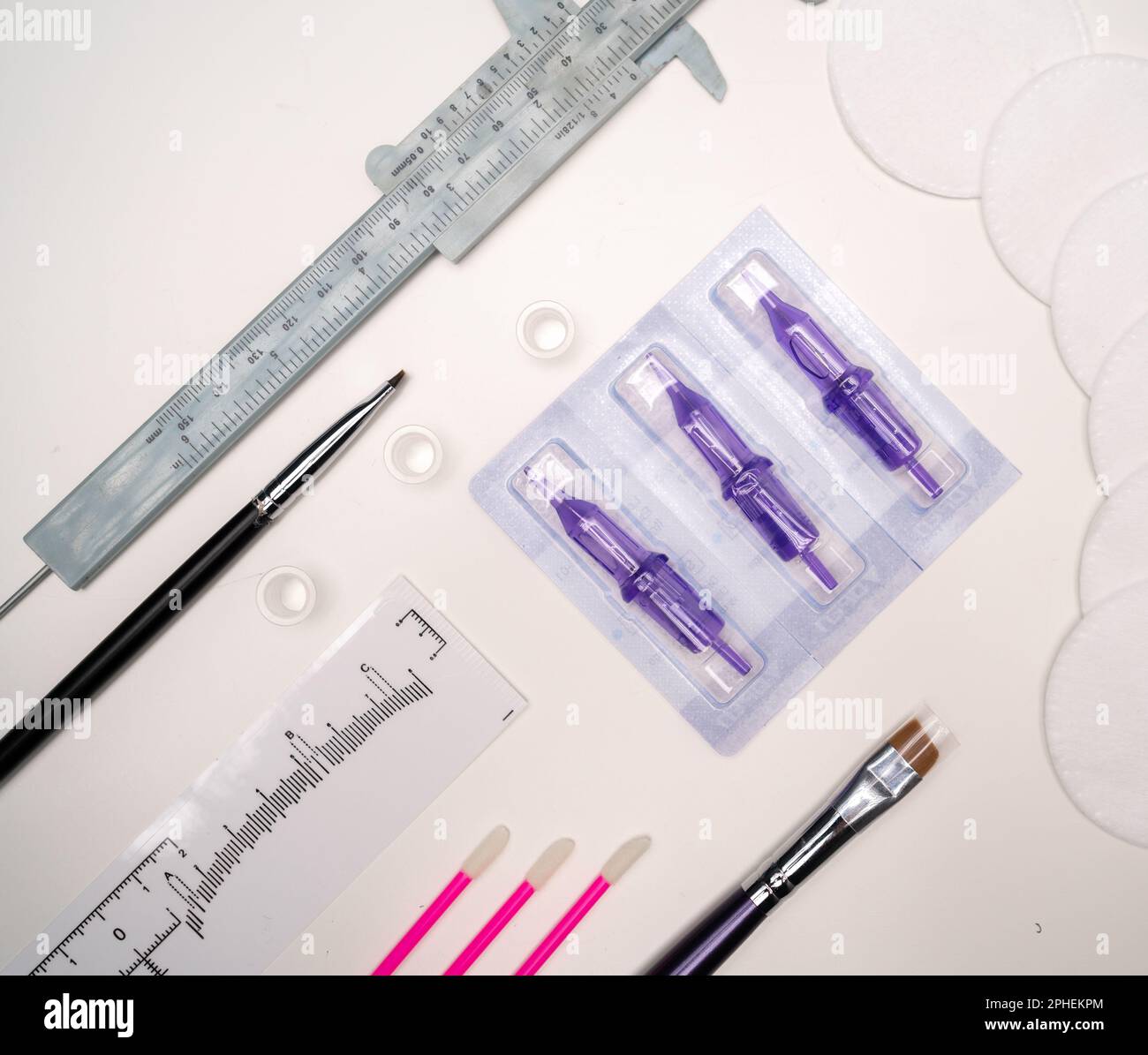 Top view of micropigmentation equipment over white background ...