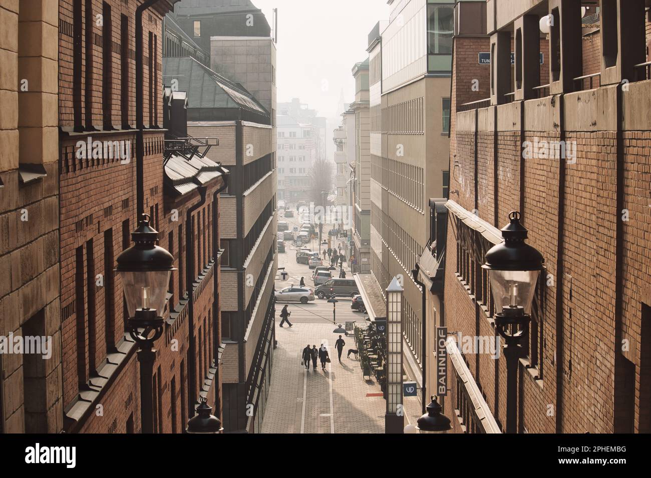 An atmospheric shot of a quaint old-fashioned cobbled street in a small ...