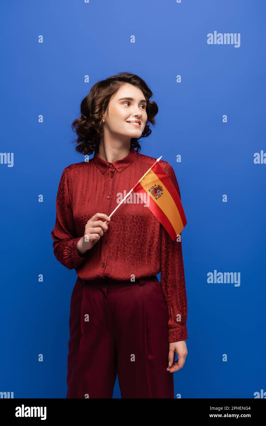 Woman holding spanish flag hi-res stock photography and images - Alamy
