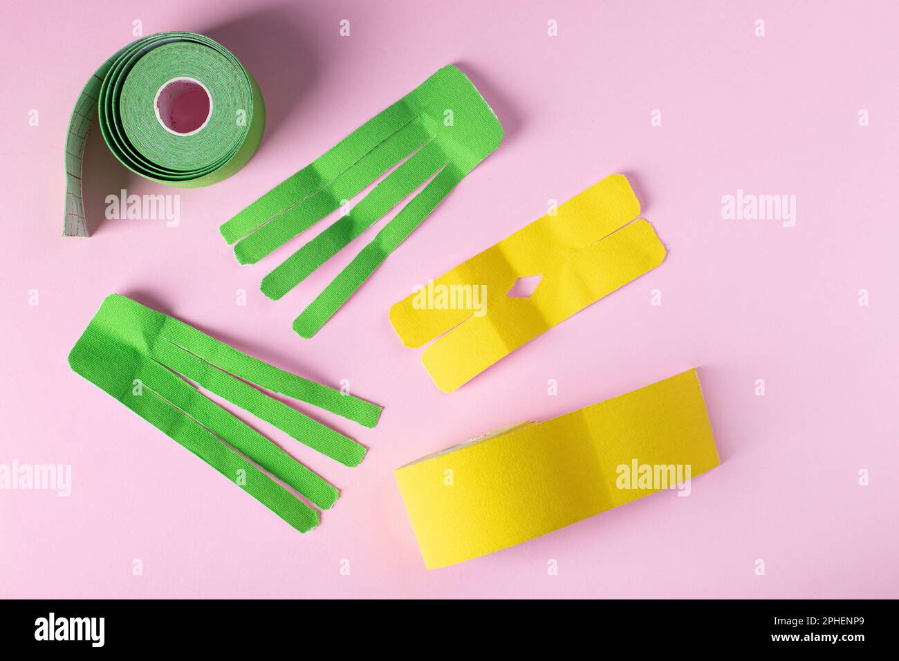 Rolls kinesiology tape in shape of an octopus and letter X for ...