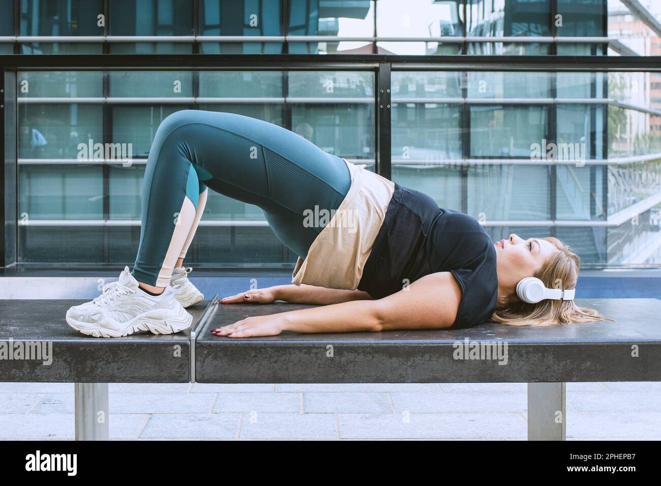 Curvy young woman in sportwear workout, plus size girl training in the ...