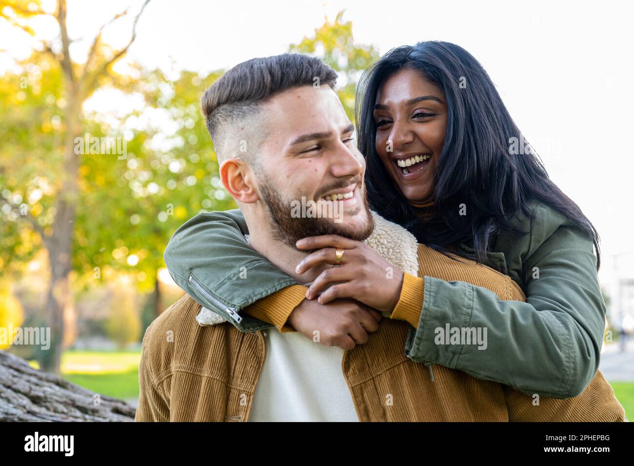 Young couple sharing emotions outside, two people cuddling, be my ...