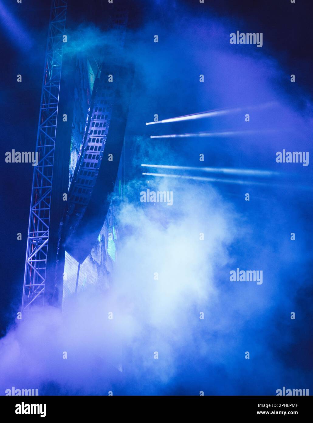 From below fragment of metal stage installation with flying ribbons and ...