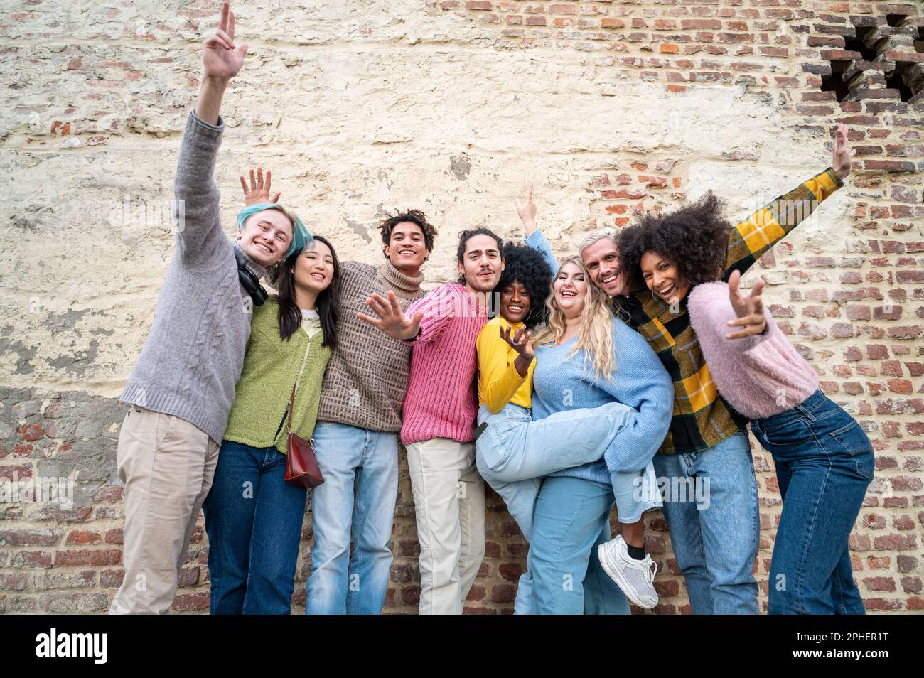 Multiracial people together in a portrait making funny faces, group of ...