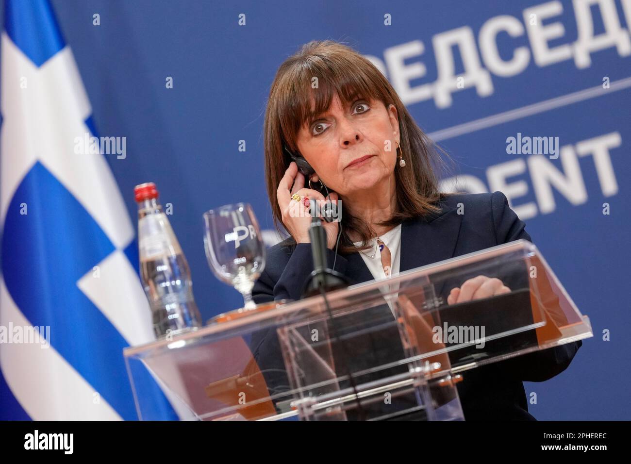 Greek President Katerina Sakellaropoulou listens her Serbian ...