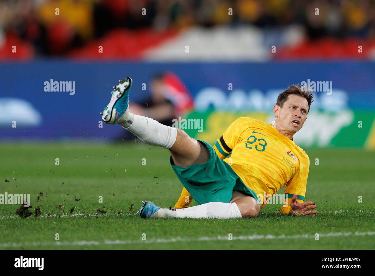 March 28, 2023, Melbourne, Australia: Craig Goodwin of Australia falls ...
